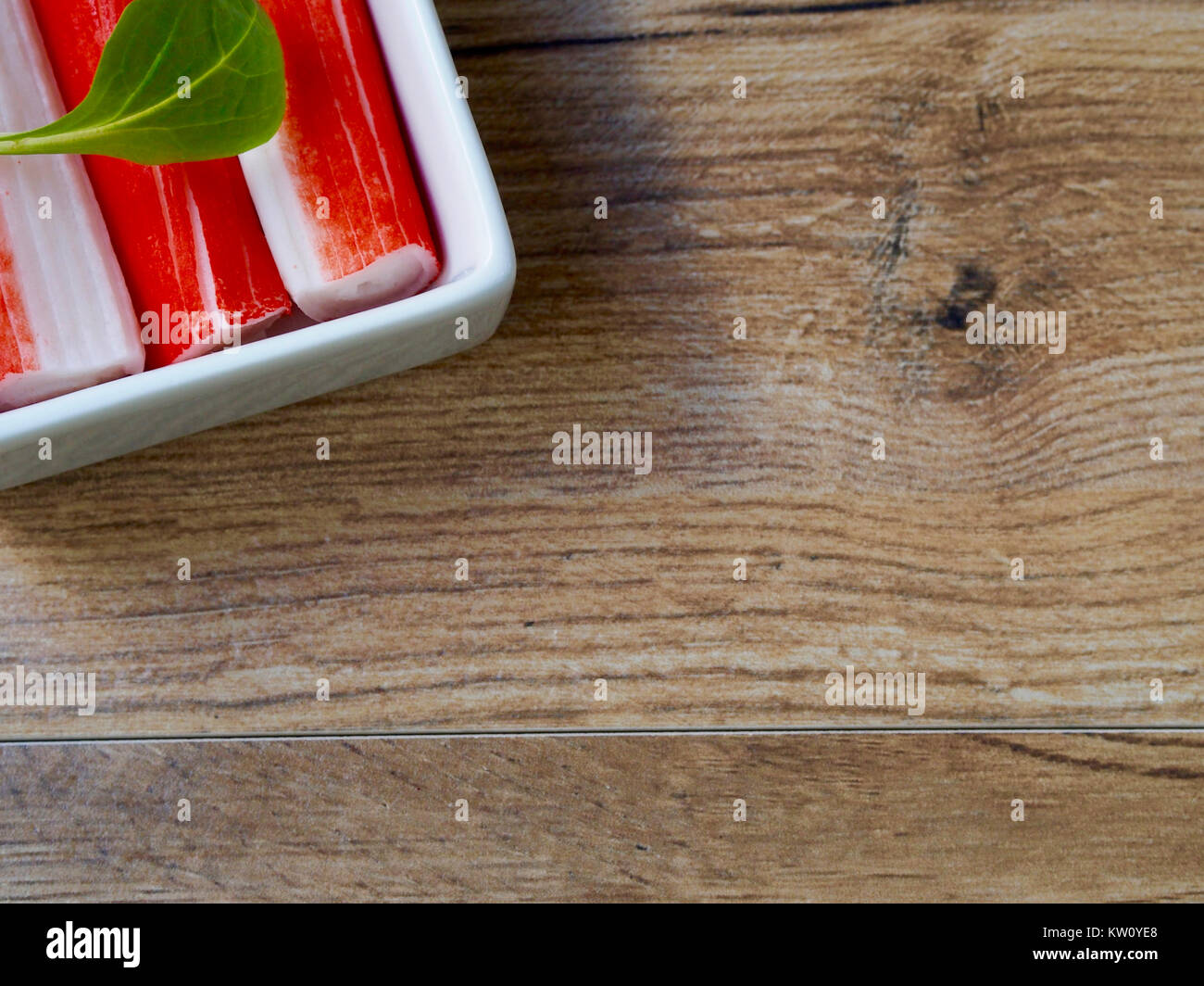 Surimi in a recipe on wood background with space for text Stock Photo ...