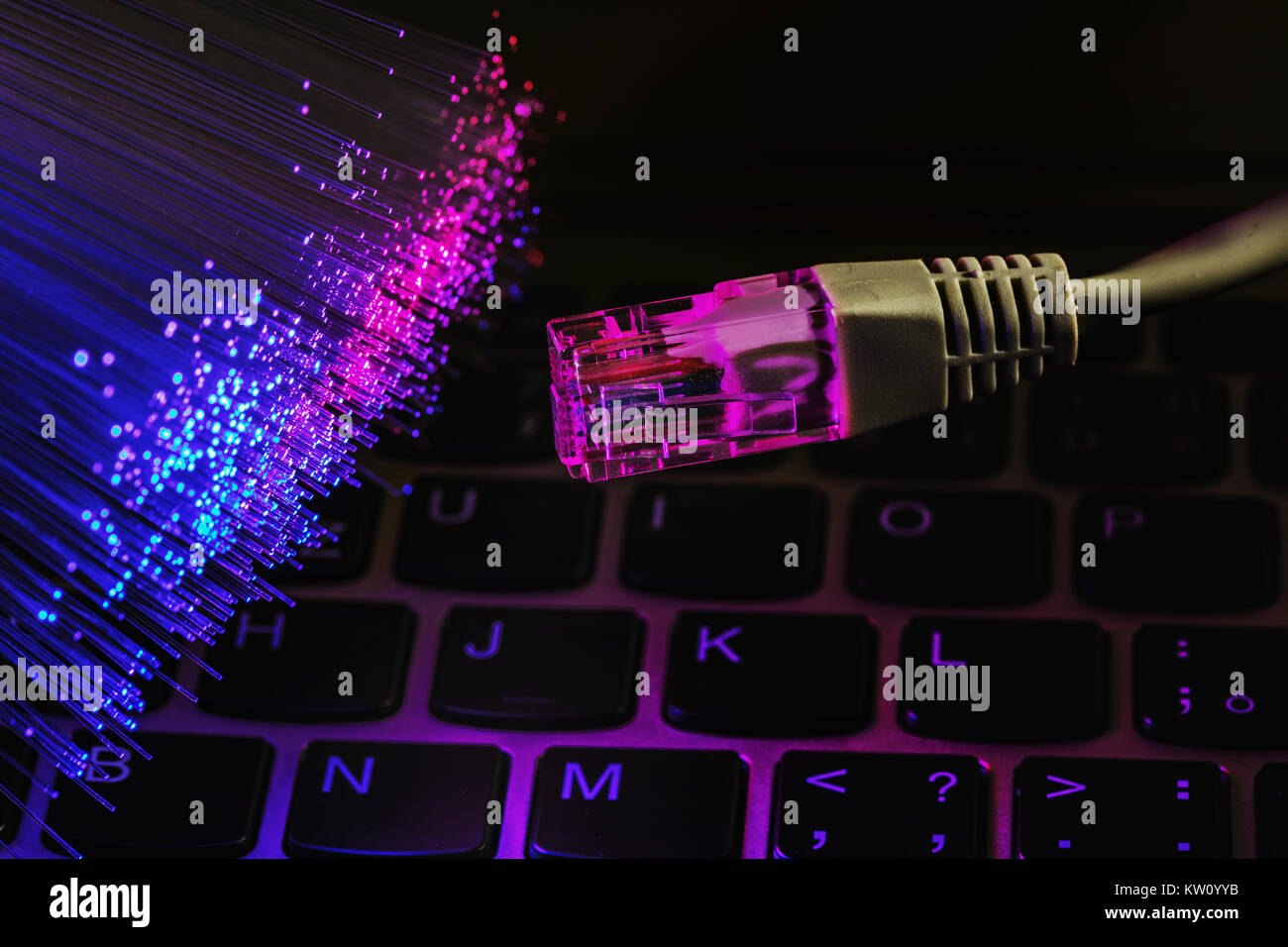 network cable closeup with fiber optical background, color fiber ...