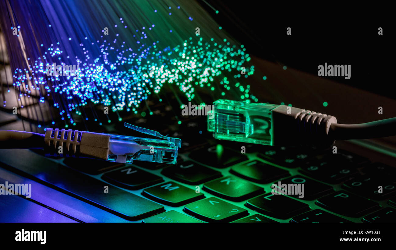 network cable closeup with fiber optical background, color fiber ...