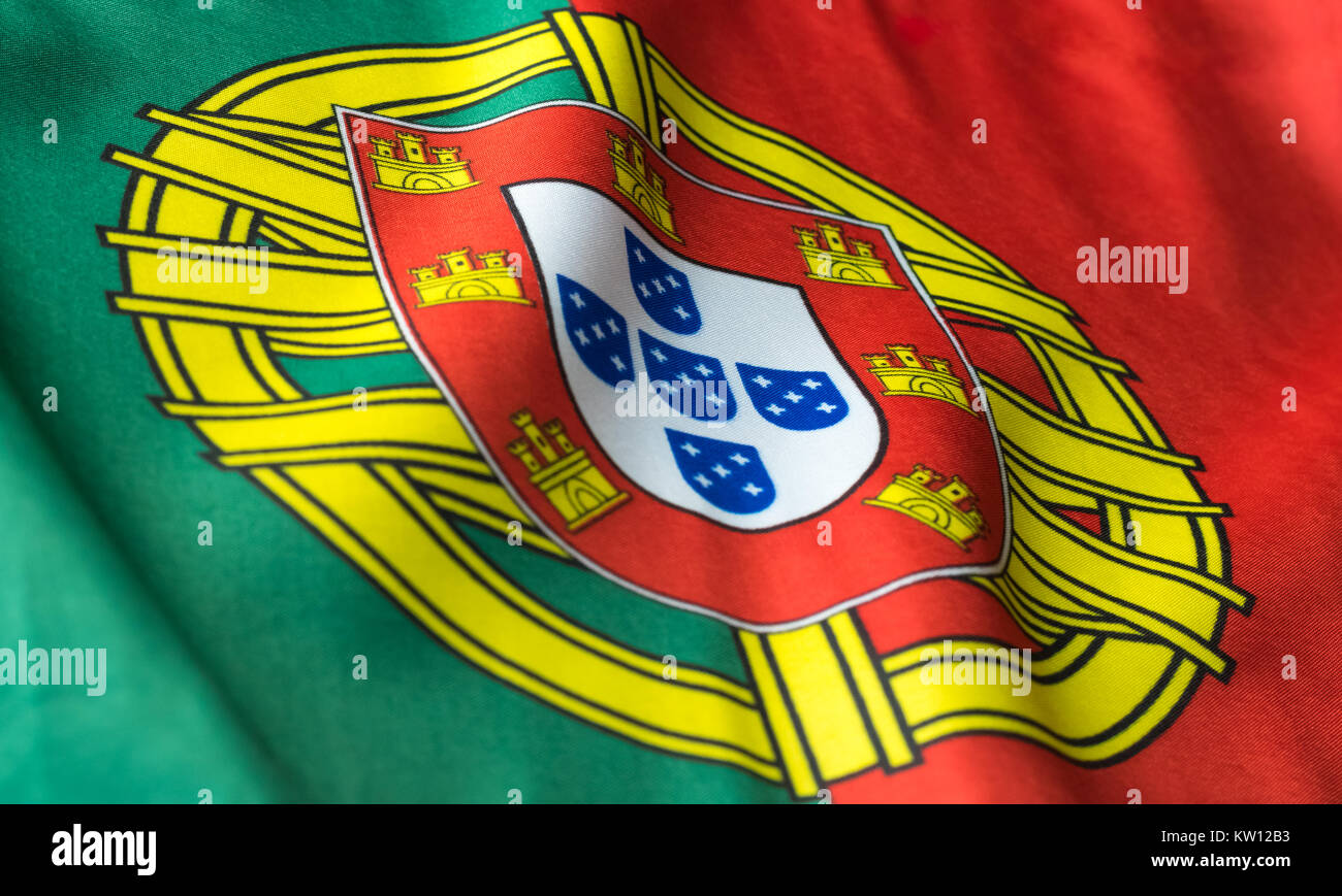 A Portuguese flag is seemingly waving in the wind. The Coat of Arms in ...