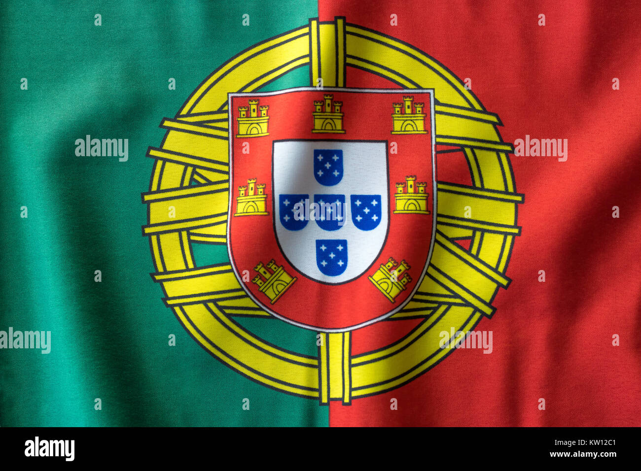 A Portuguese flag is seemingly waving in the wind. The Coat of Arms in ...
