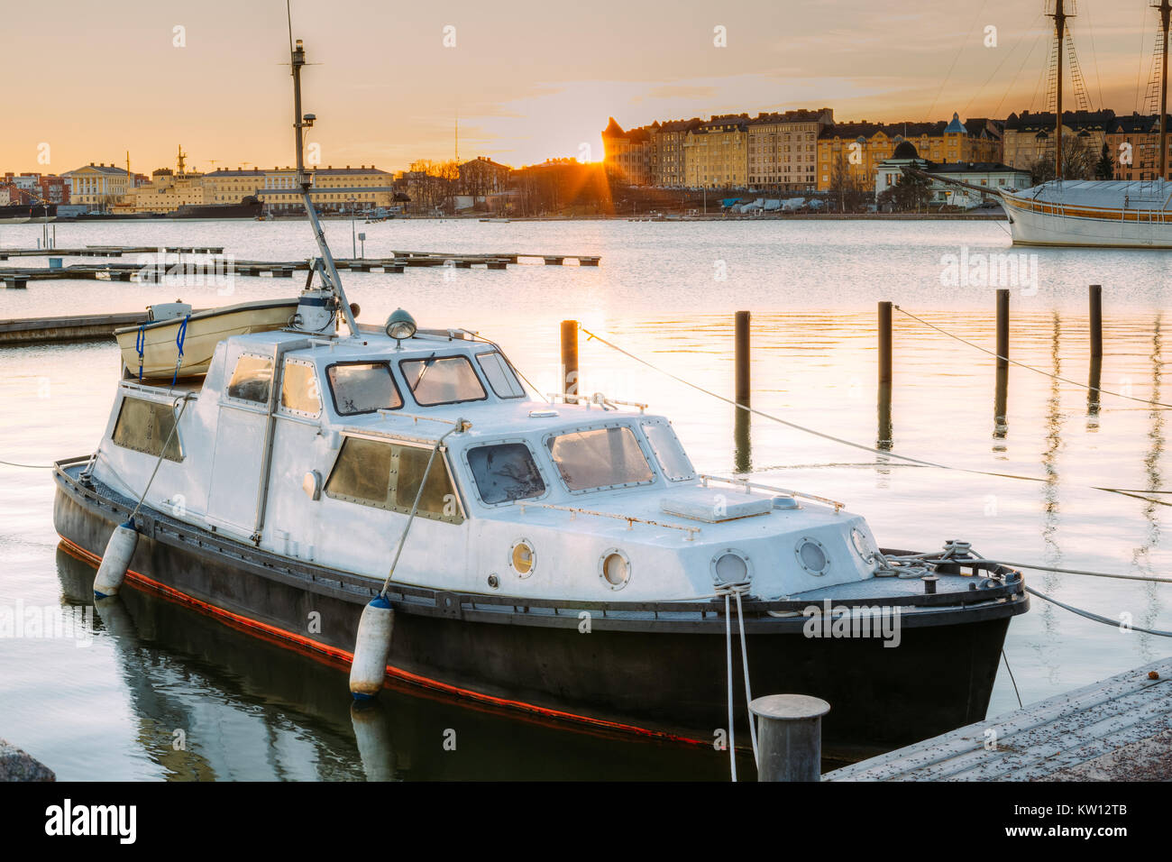 Helsinki, Finland. Marine Boat, Powerboat Moored At Berth In Sunrise ...