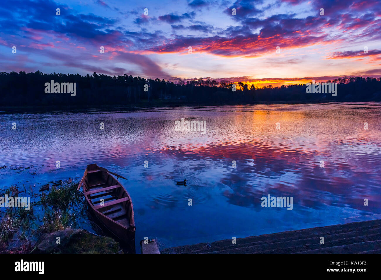 Beautiful morning with rising sun and colorful sky Stock Photo - Alamy