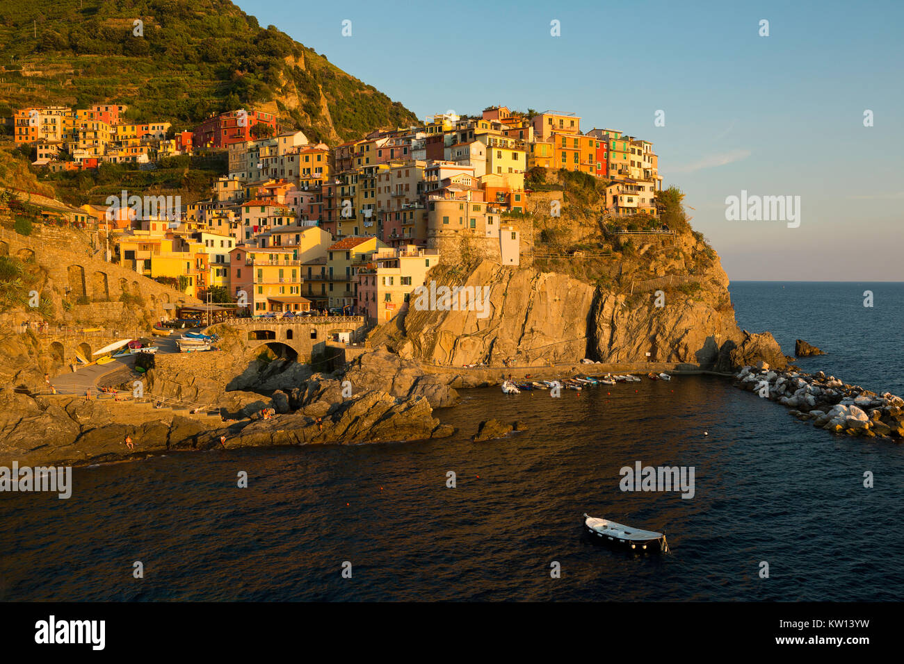 The town of Manarola, Italy is part of Cinque Terra as seen at sunset ...