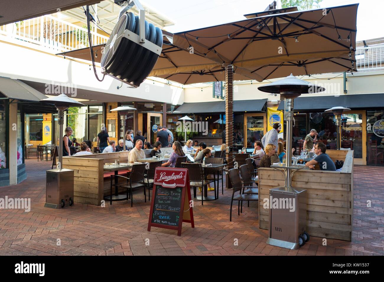 In Orinda's Theatre Square shopping center, diners eat at outdoor ...