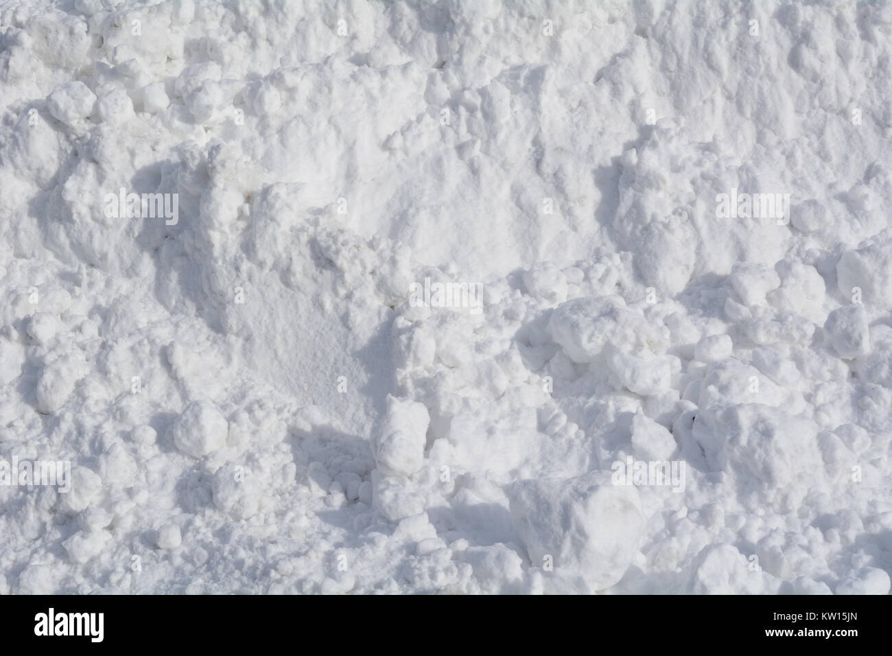 Snow background landscape from close up of huge pile of snow after ...