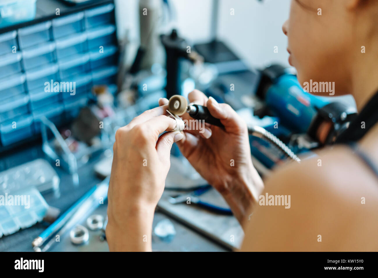The girl is engaged in jewelry business Stock Photo - Alamy
