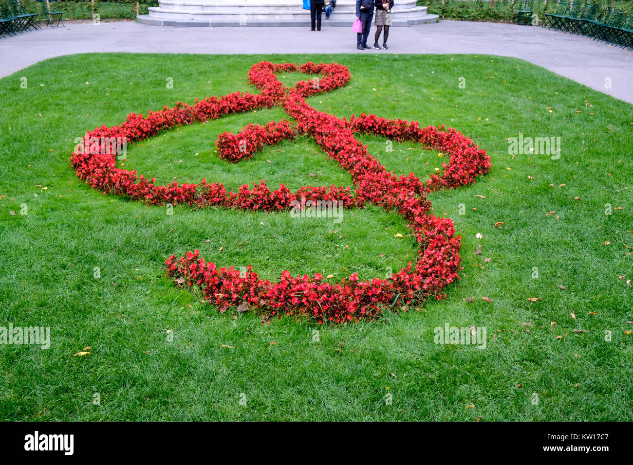 Mozart statue in the Burggarten, with treble clef on lawn made from red ...