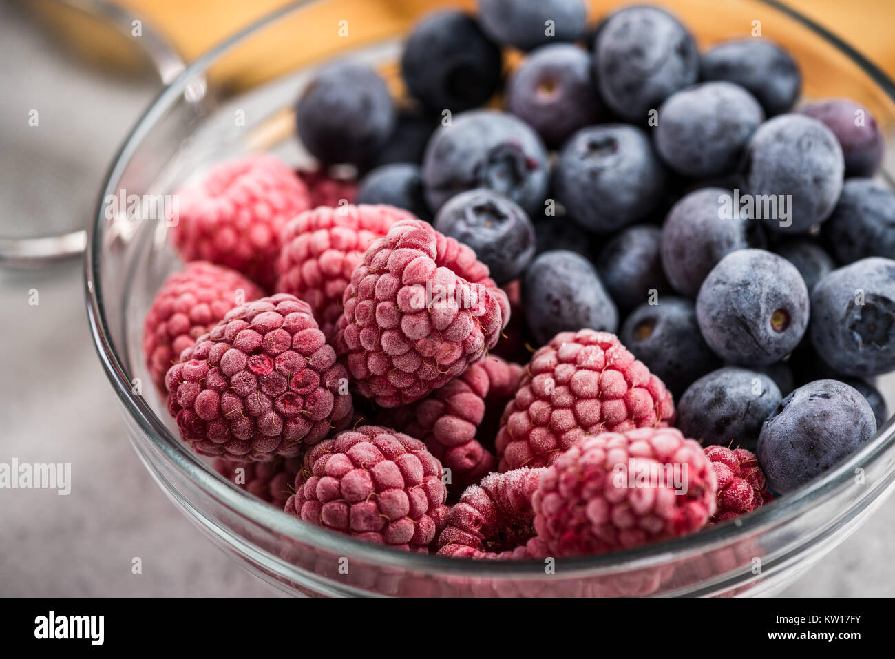 Bowl with frozen berry fruits Stock Photo - Alamy