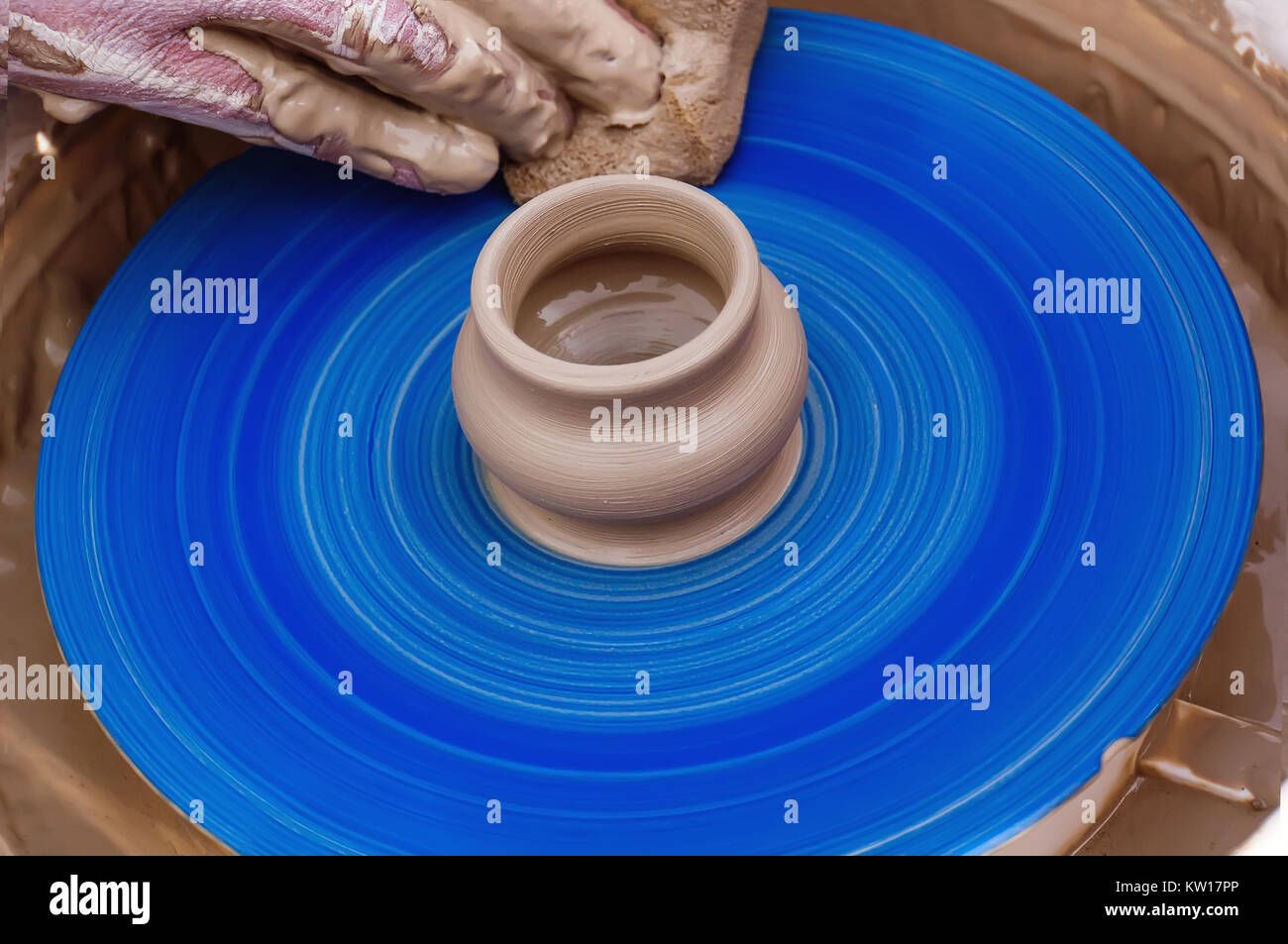 manufacturing pitcher hands on a rotating frame. The old craft of ...