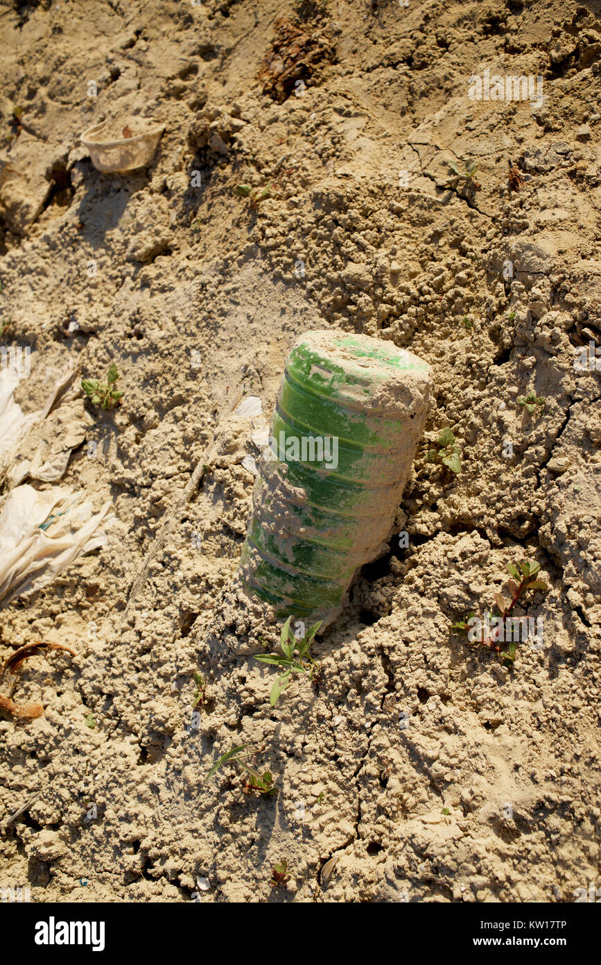Plastic in mud hi-res stock photography and images - Alamy