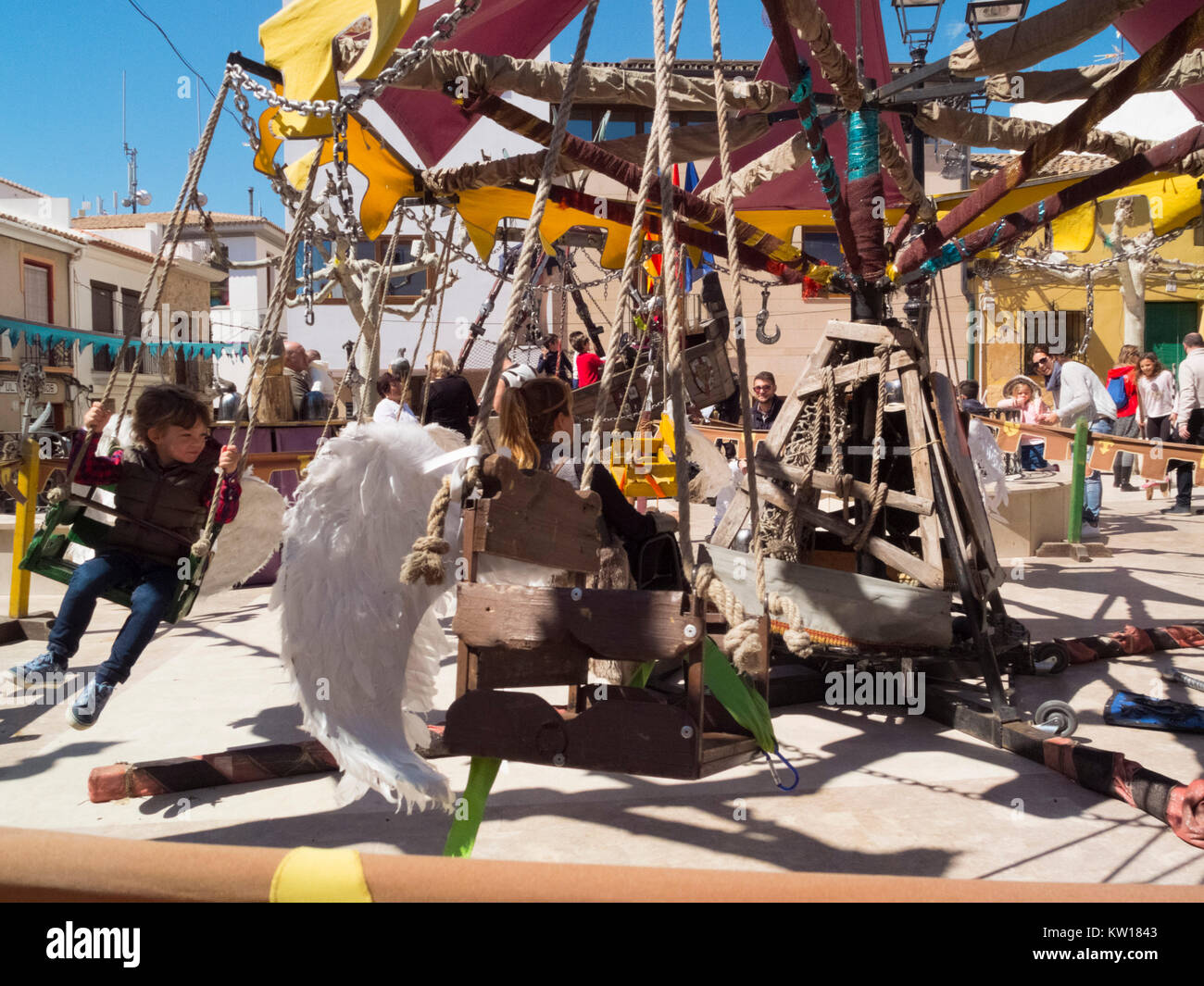 medieval childrens carousel during mediaval festival in Lliber village ...
