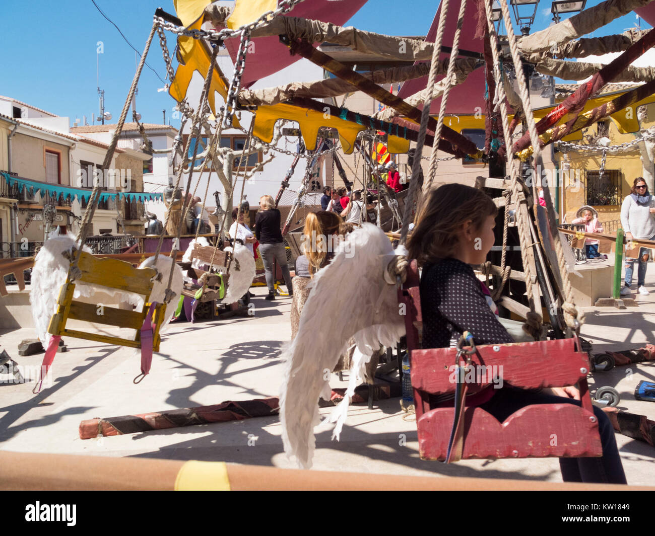 medieval childrens carousel during mediaval festival in Lliber village ...