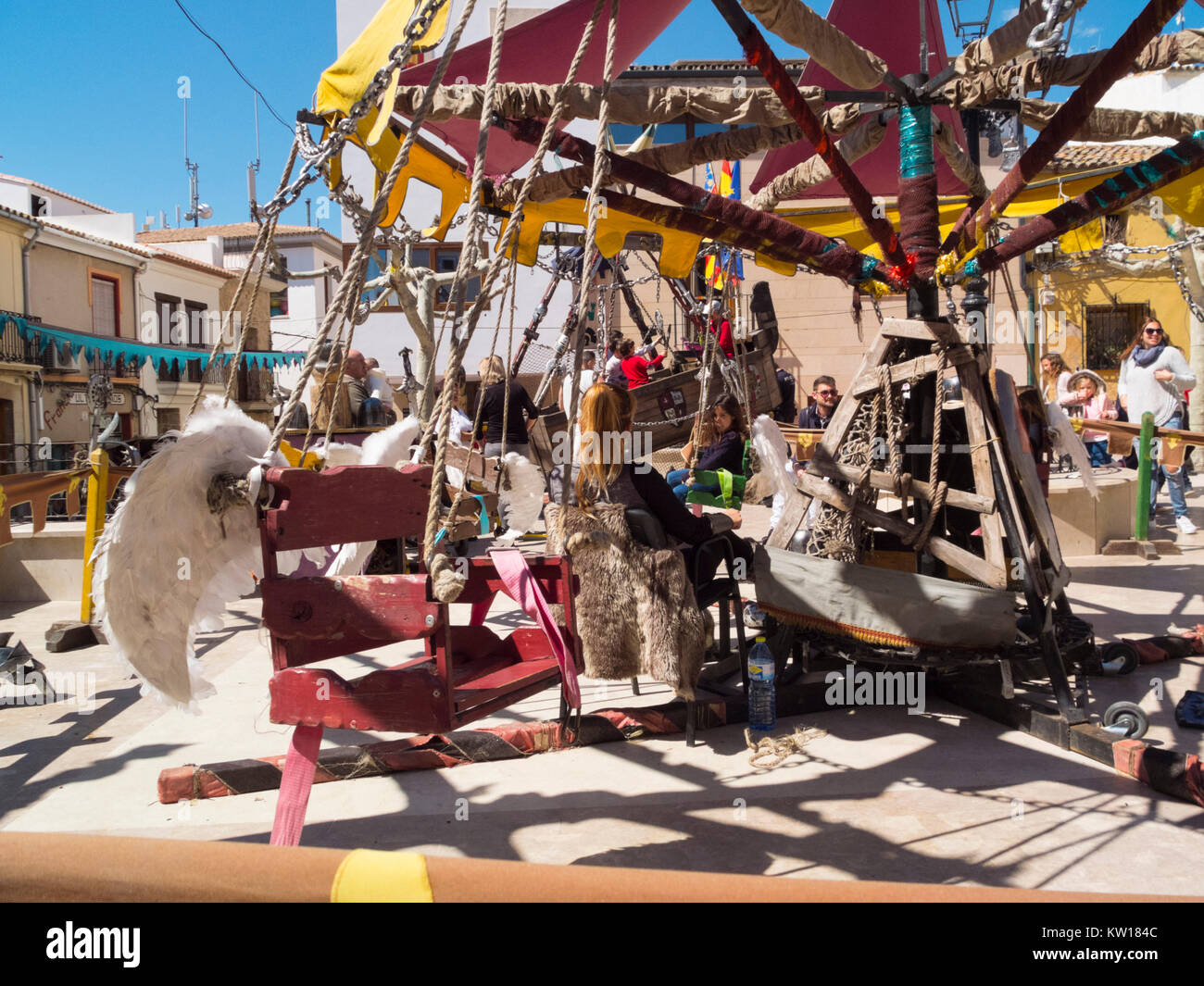medieval childrens carousel during mediaval festival in Lliber village ...