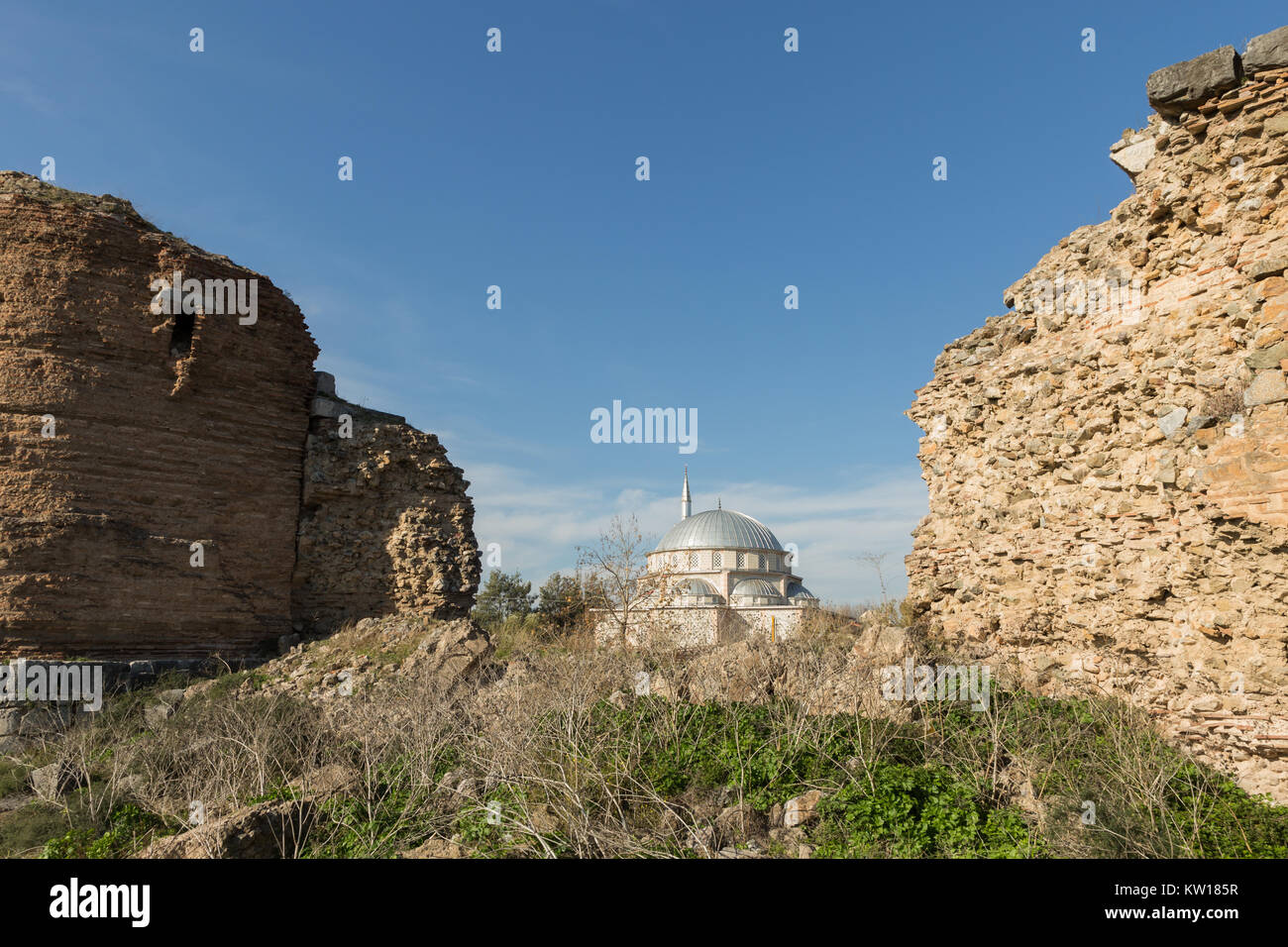 modern mosque as seen through the historic ancient city walls of Nicea ...