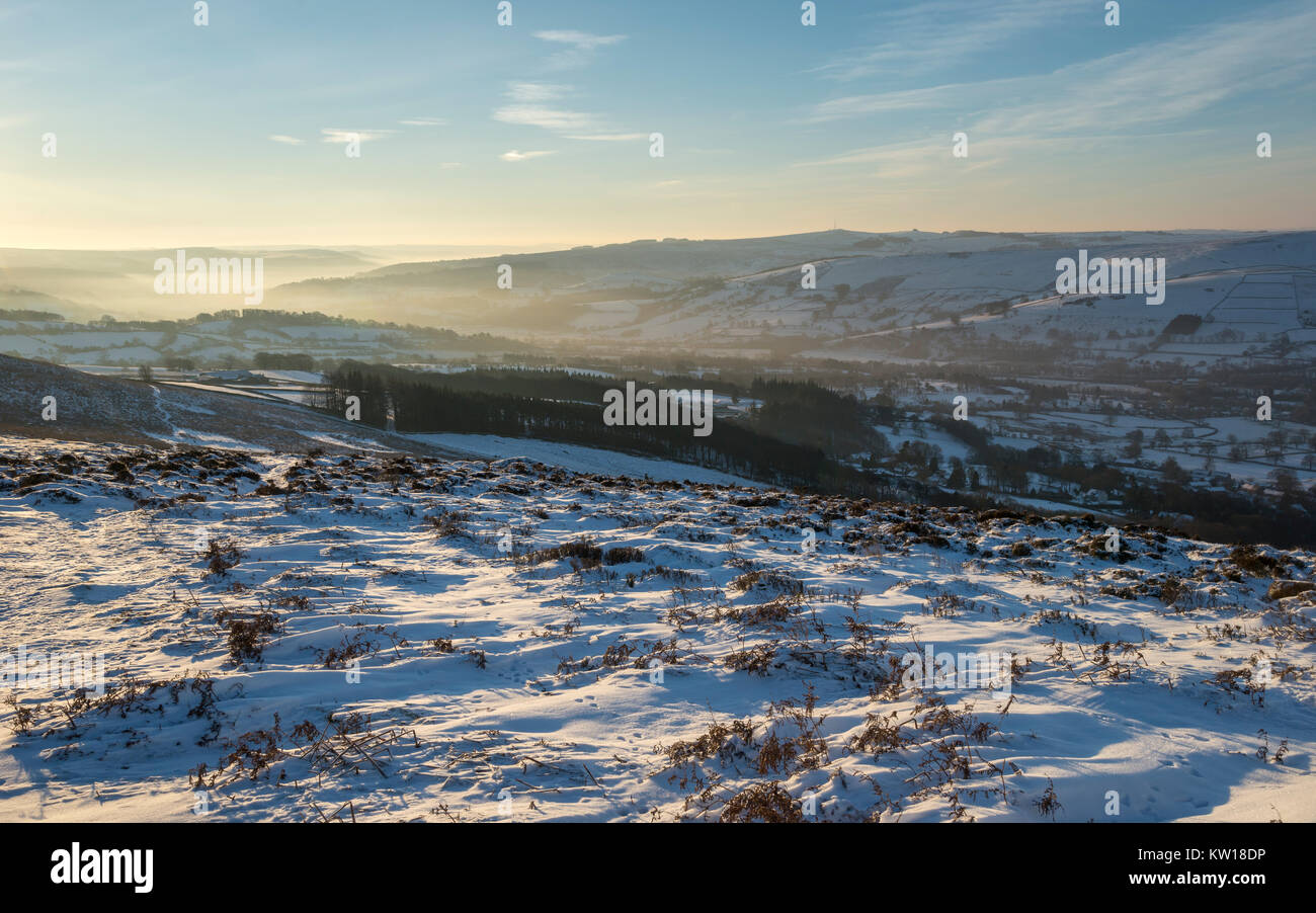 Snowy winter morning at Bamford Edge in the Peak District national park ...