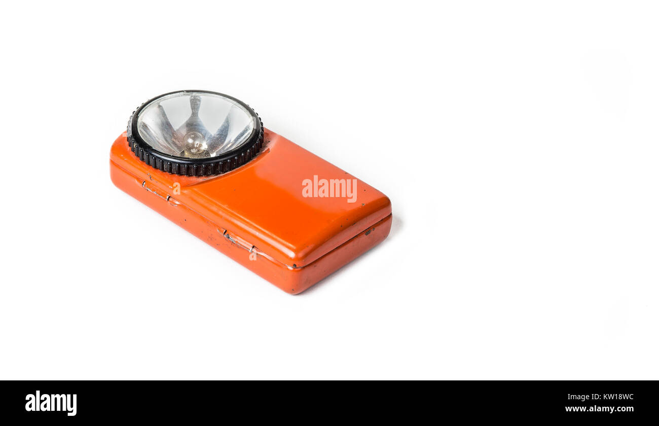Old battery flashlight on the white background Stock Photo - Alamy