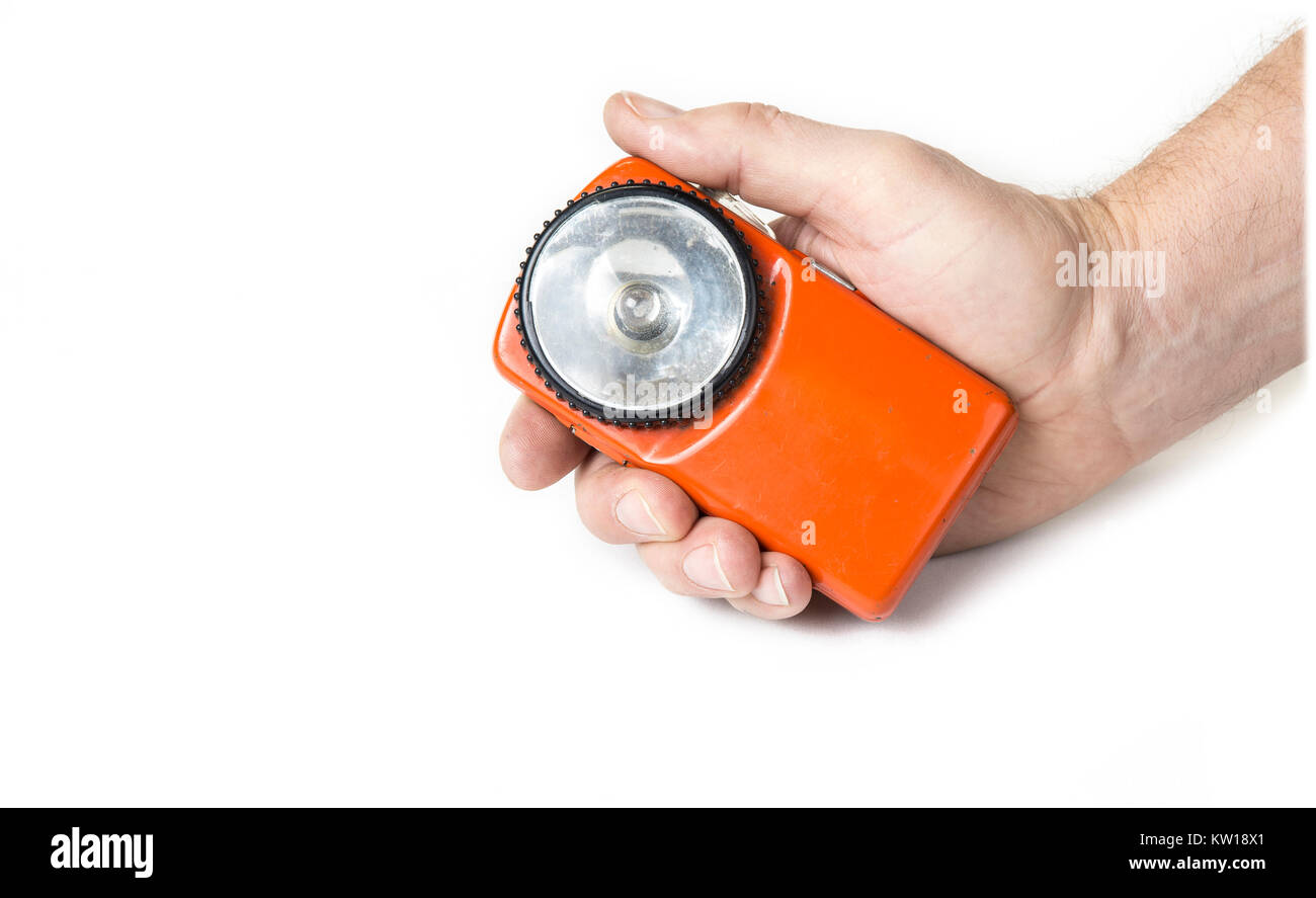 Old battery flashlight on the white background Stock Photo - Alamy