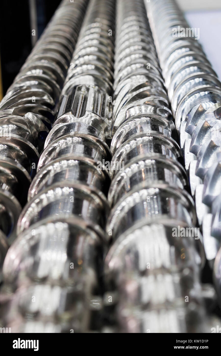 Screw Press Spare parts ; For plastic injection process Stock Photo - Alamy