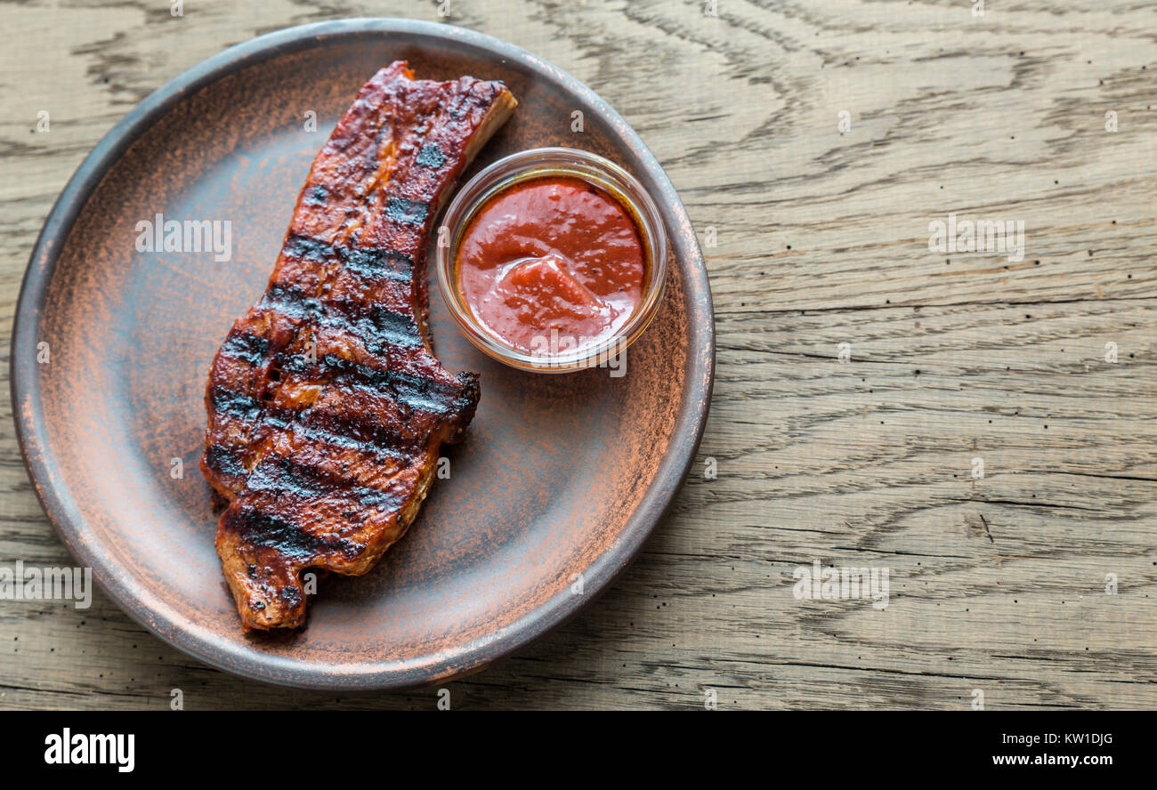 Portion of grilled pork ribs Stock Photo - Alamy