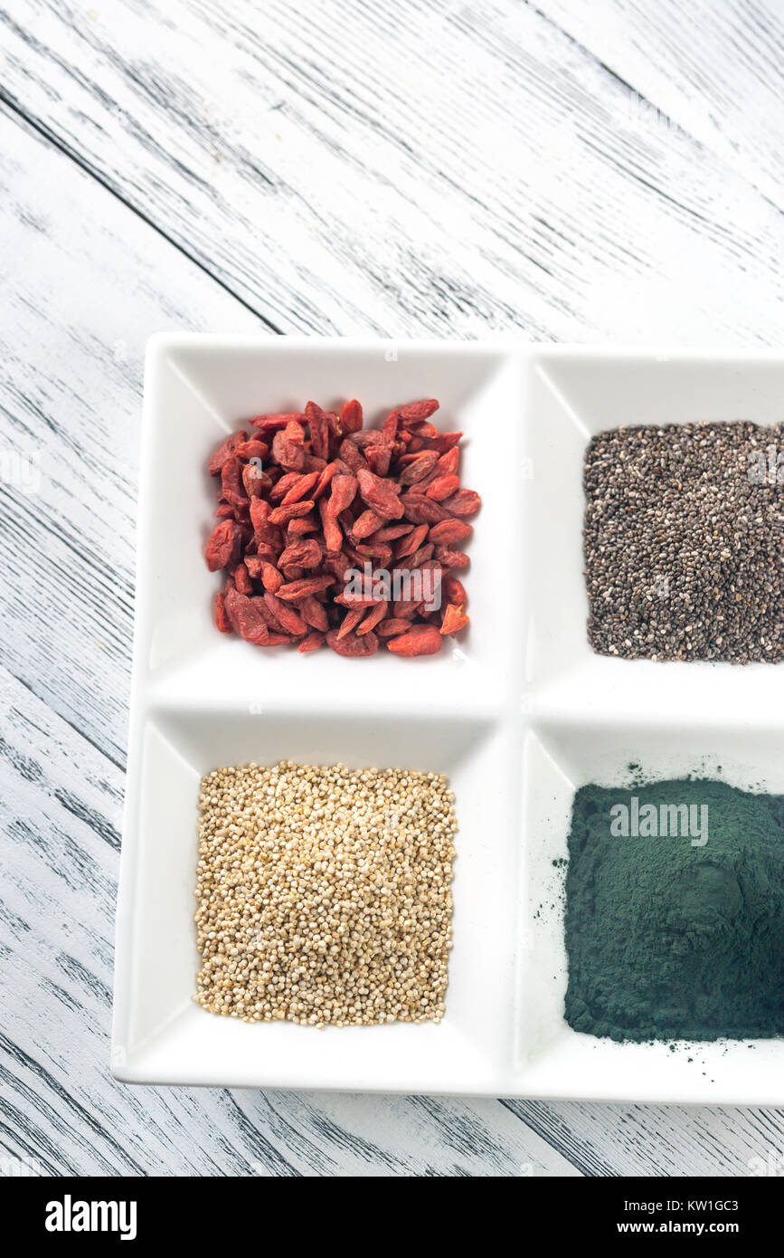 Superfoods on the four-section plate Stock Photo - Alamy