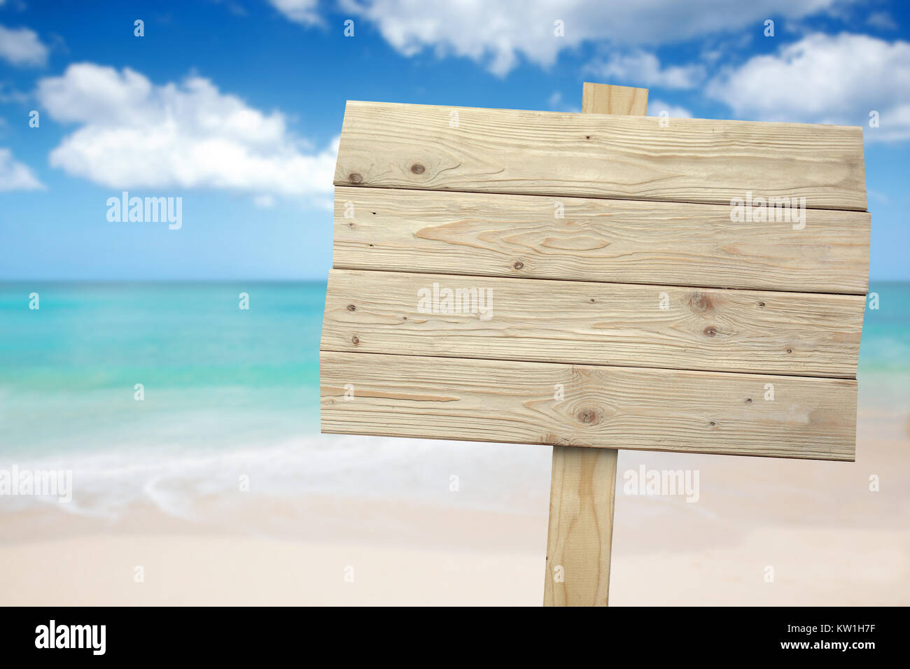Vintage rustic wooden sign on the beach Stock Photo - Alamy
