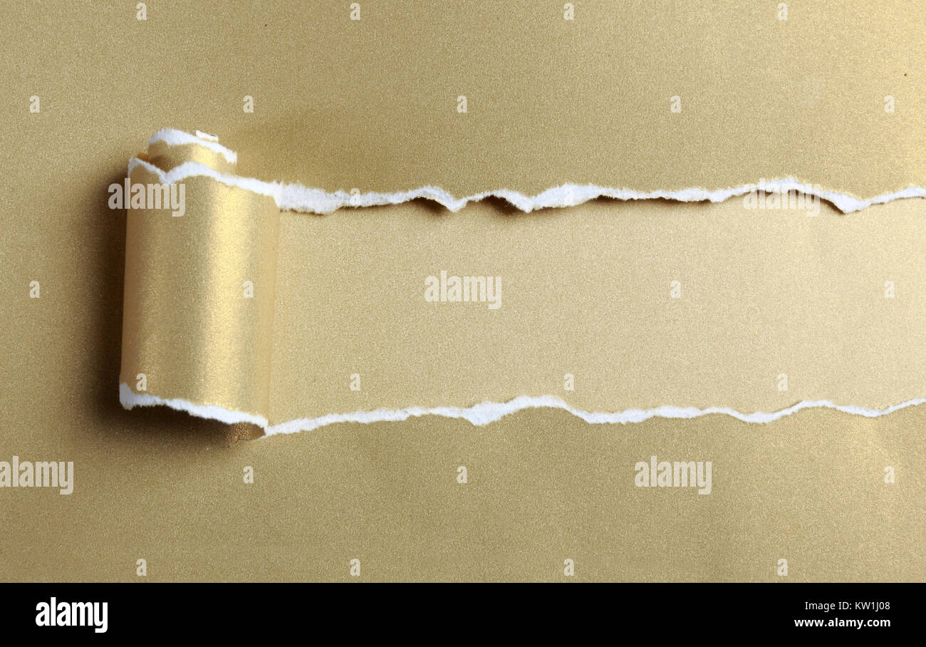 ripped gold paper Stock Photo - Alamy