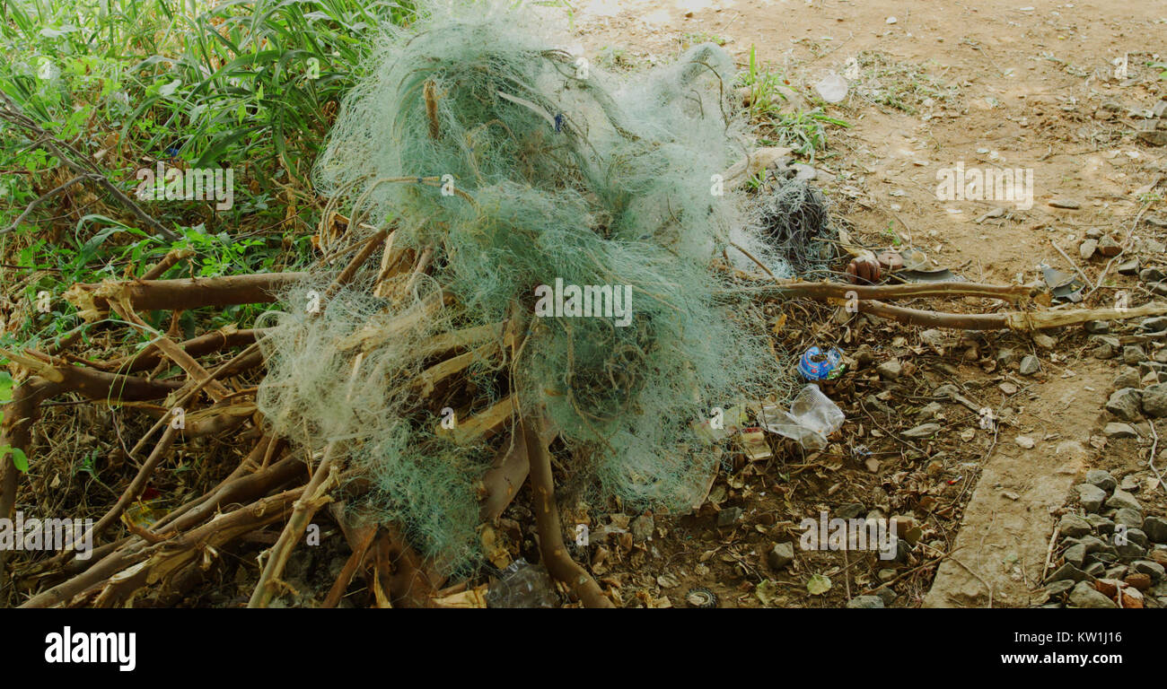Closeup damaged fish nets Stock Photo - Alamy