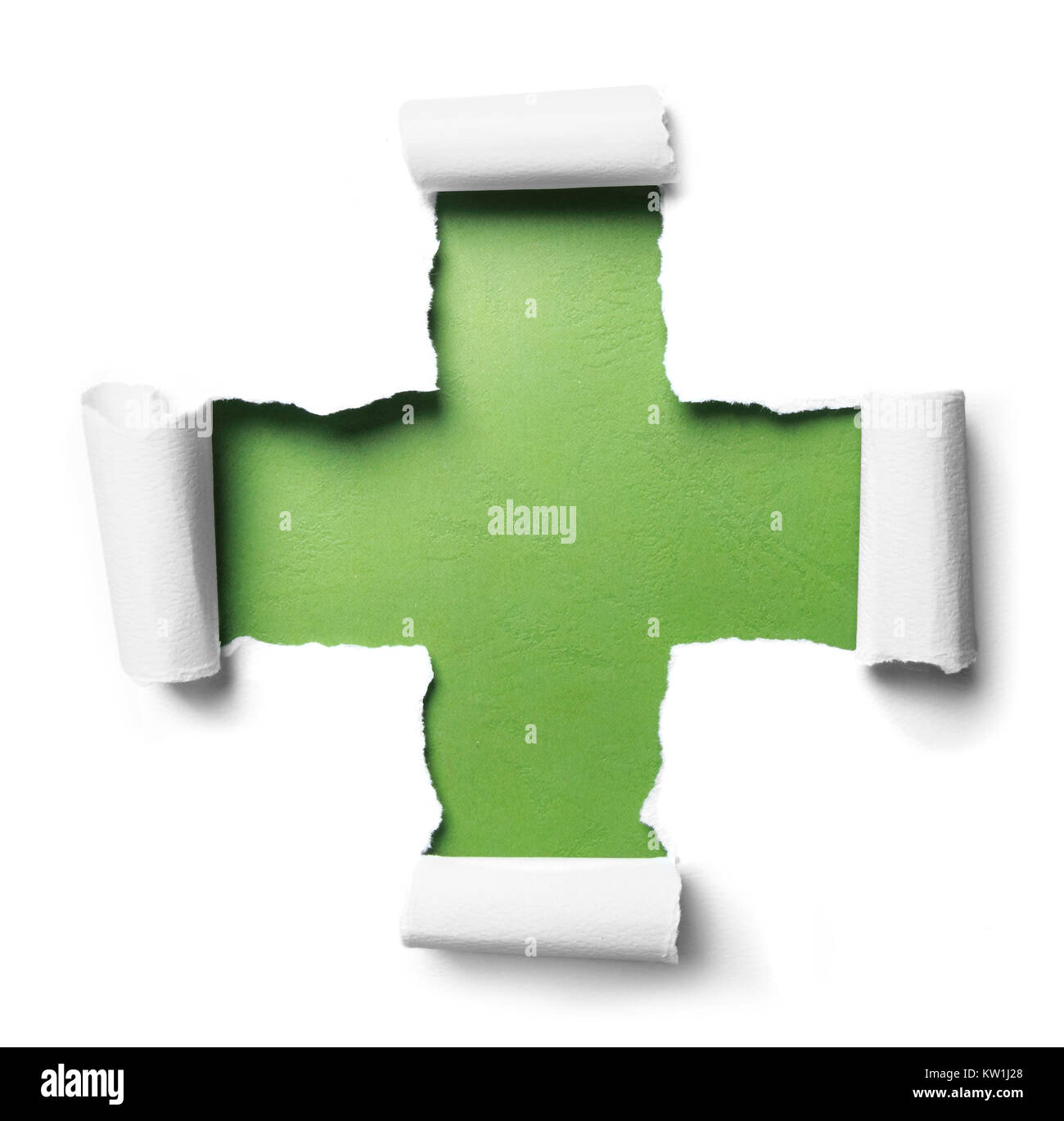 white torn paper with plus shape over green Stock Photo - Alamy