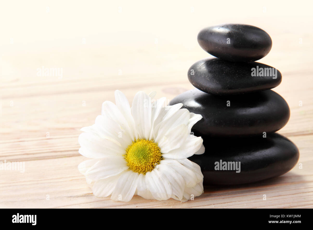 zen basalt stones and flower Stock Photo - Alamy