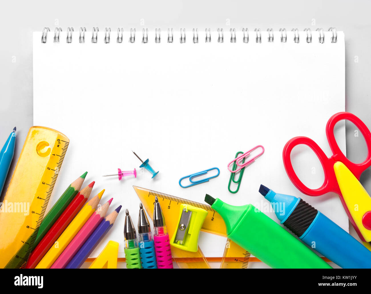 School supplies on white background Stock Photo - Alamy