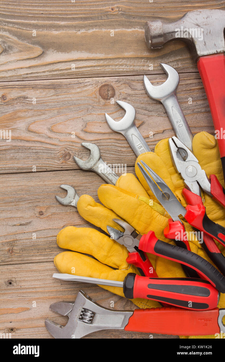mechanical kit in wooden background. construction tool Stock Photo - Alamy