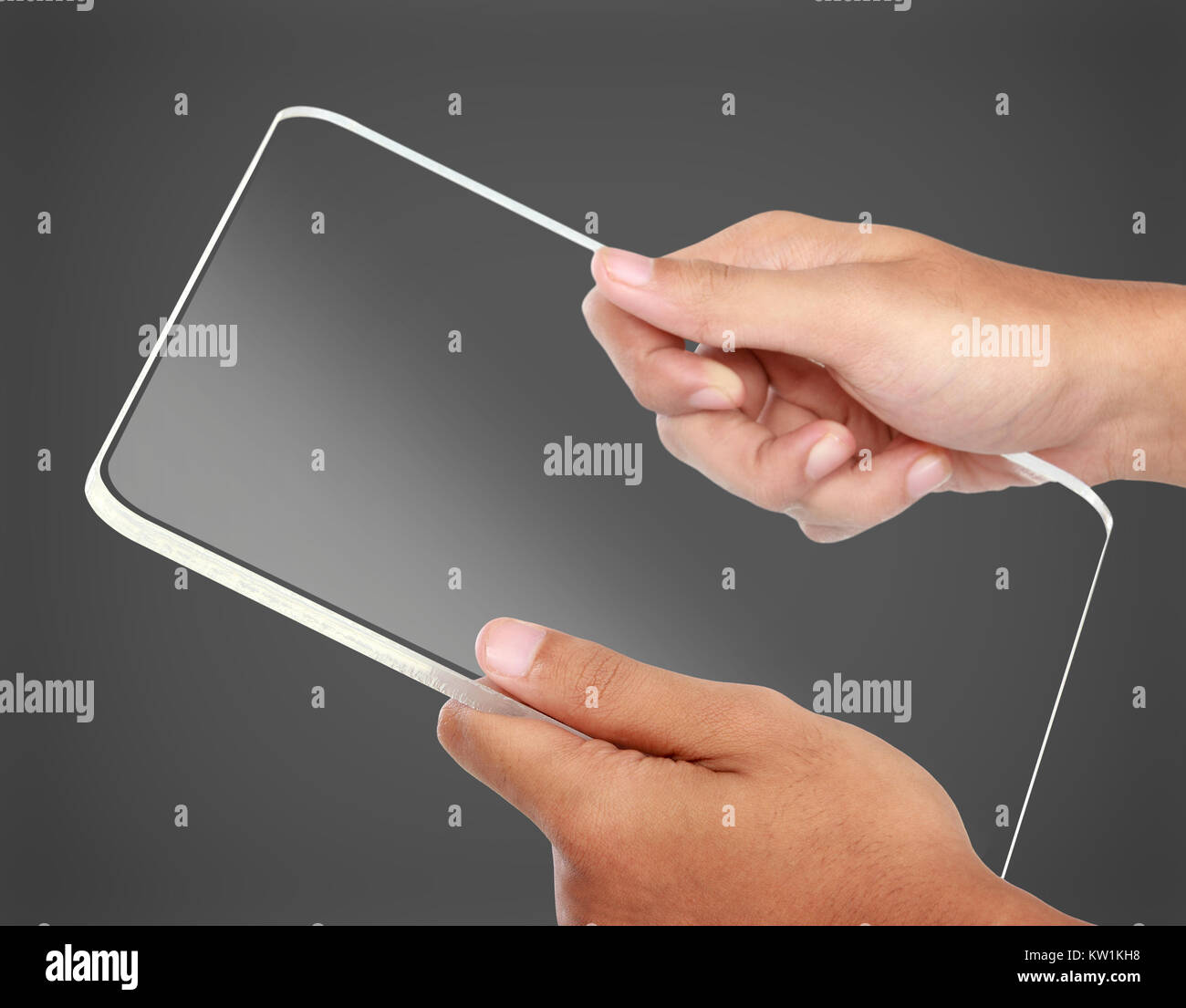 hands holding futuristic transparent tablet pc Stock Photo - Alamy