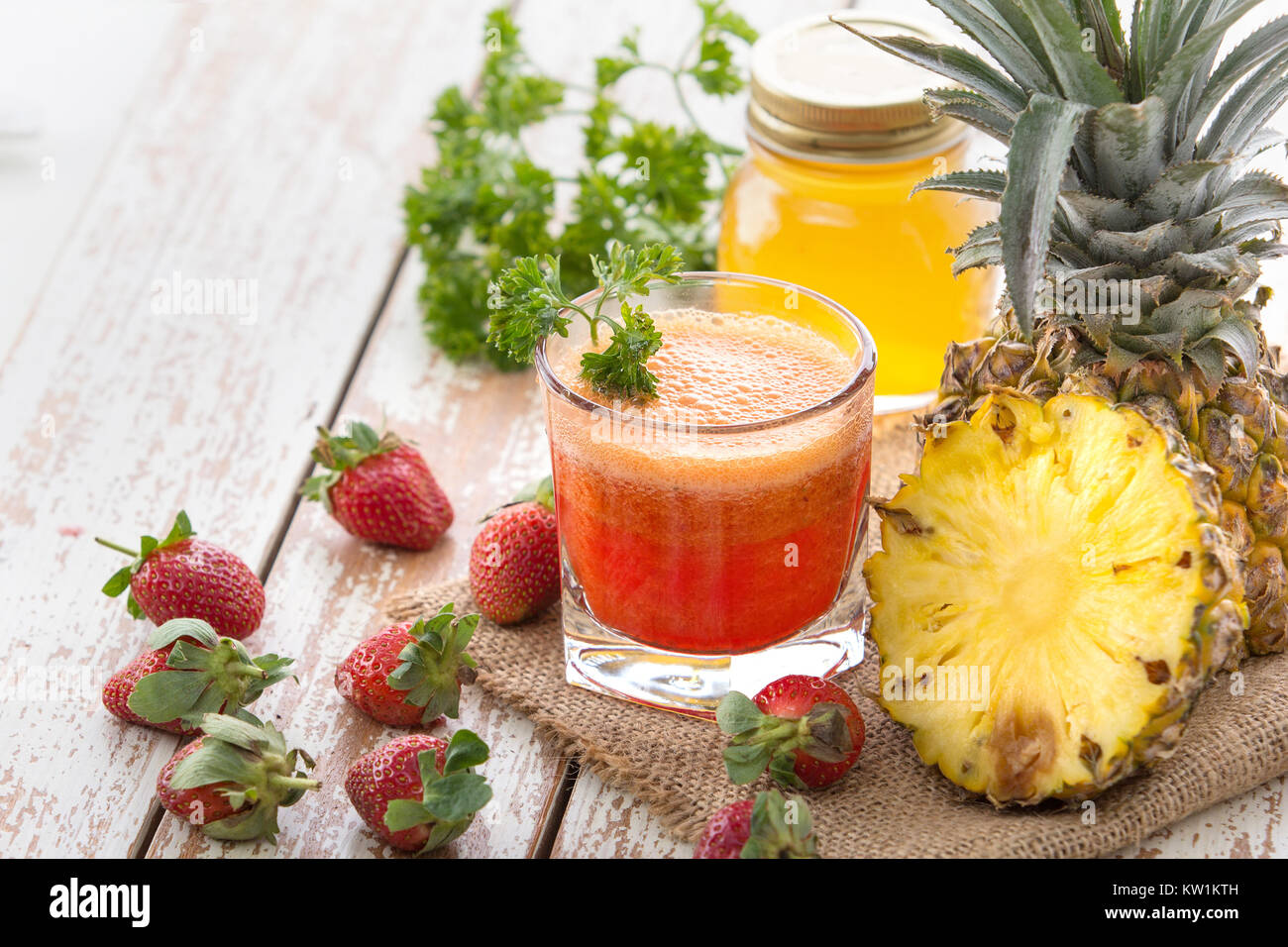 Pineapple and Strawberry mix juice Stock Photo - Alamy