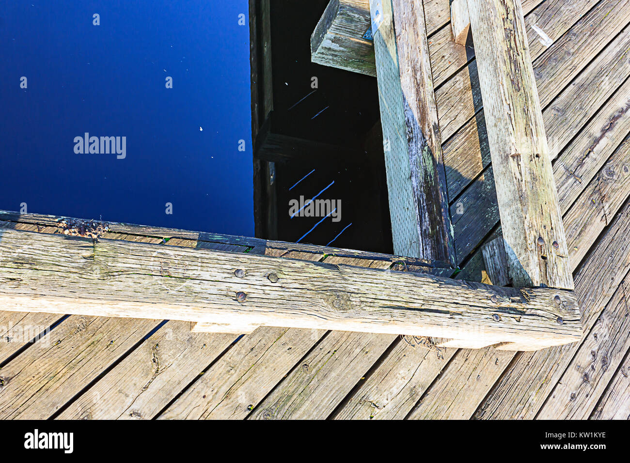 blue water and white bleached dock Stock Photo - Alamy