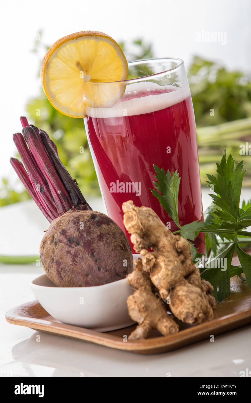 Beet and herbs mix juice Stock Photo - Alamy