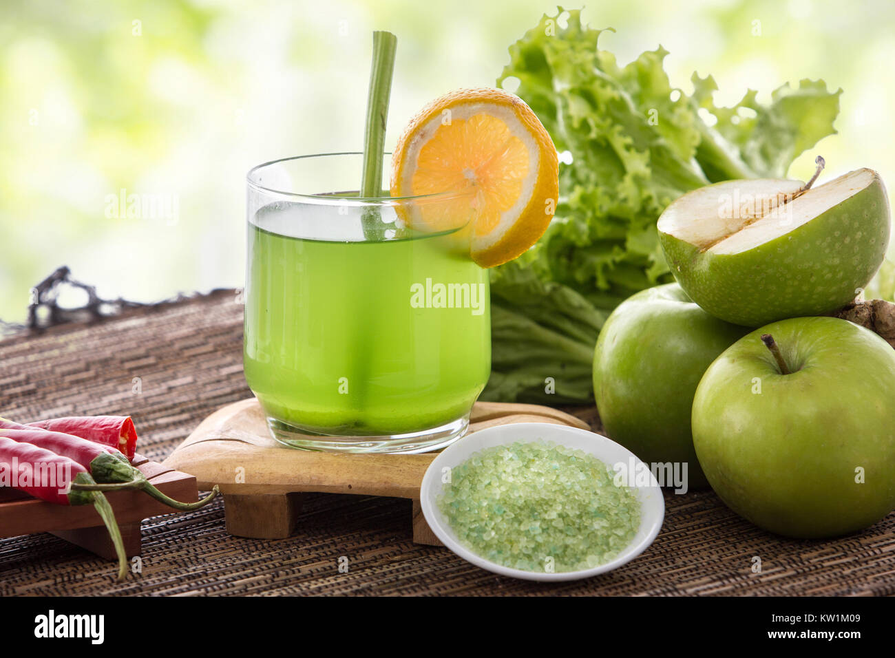 Apple and green vegetables mix juice Stock Photo - Alamy