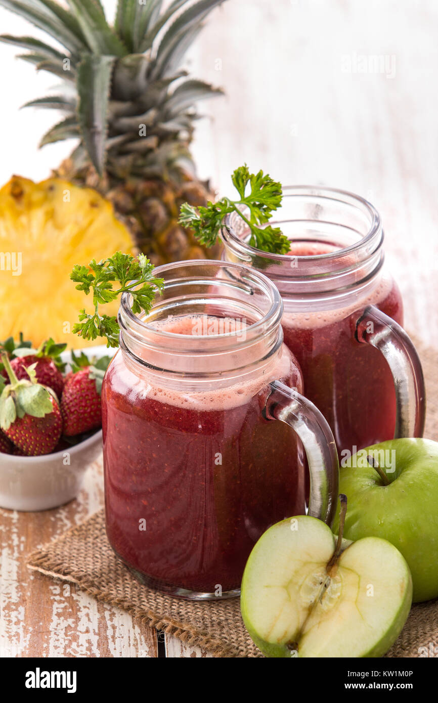 Pineapple, apple and Strawberry mix juice Stock Photo - Alamy