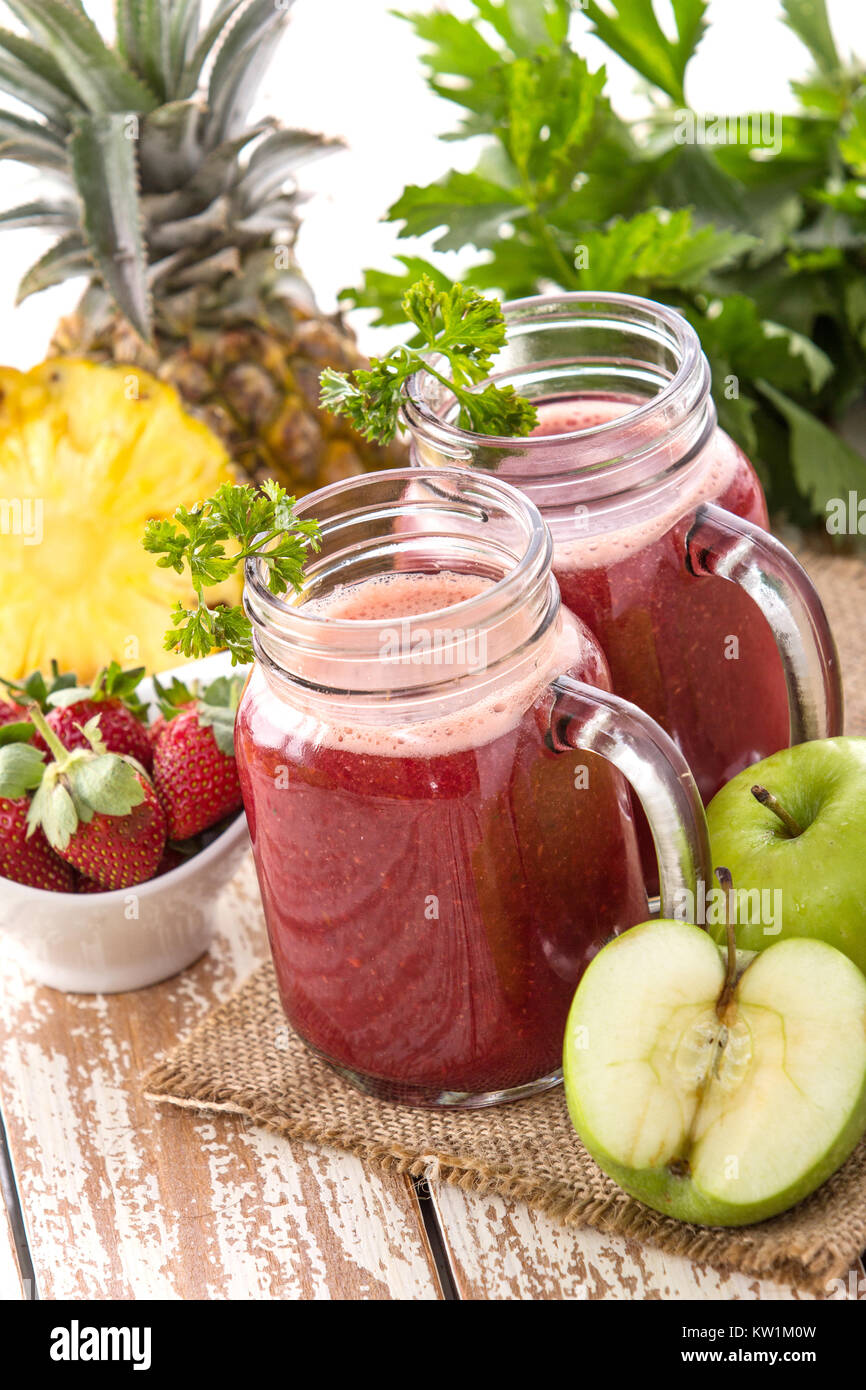 Pineapple, apple and Strawberry mix juice Stock Photo - Alamy