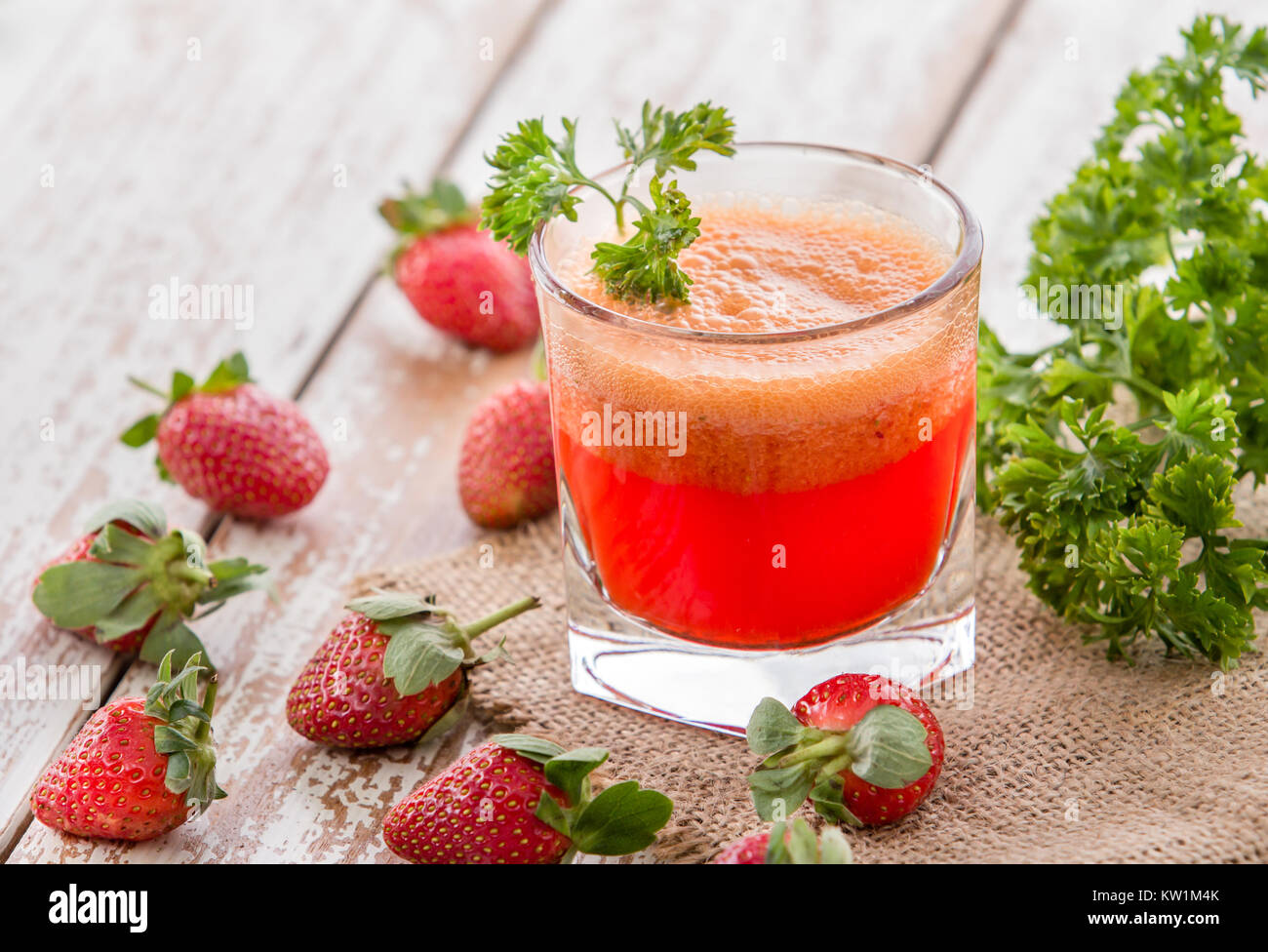 a glass of fresh strawberry juice Stock Photo - Alamy