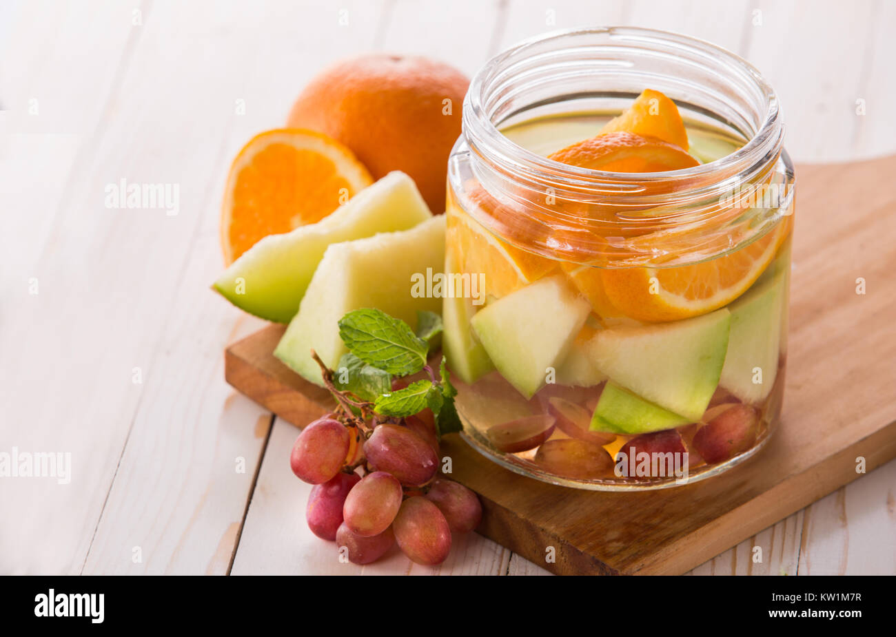 fresh fruit Flavored infused water mix of orange, grape and melo Stock ...