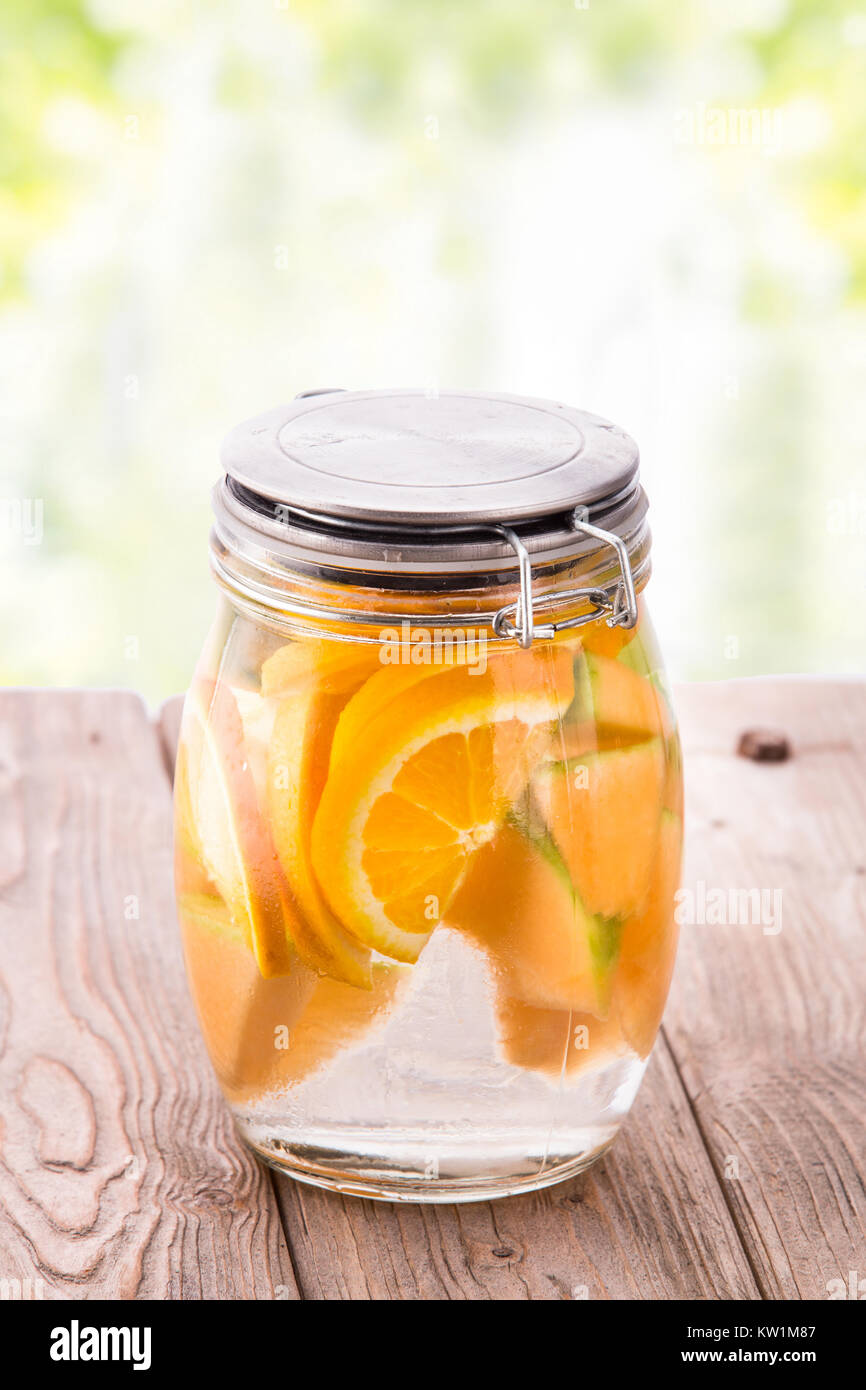 fresh fruit Flavored infused water mix of orange and melon Stock Photo ...