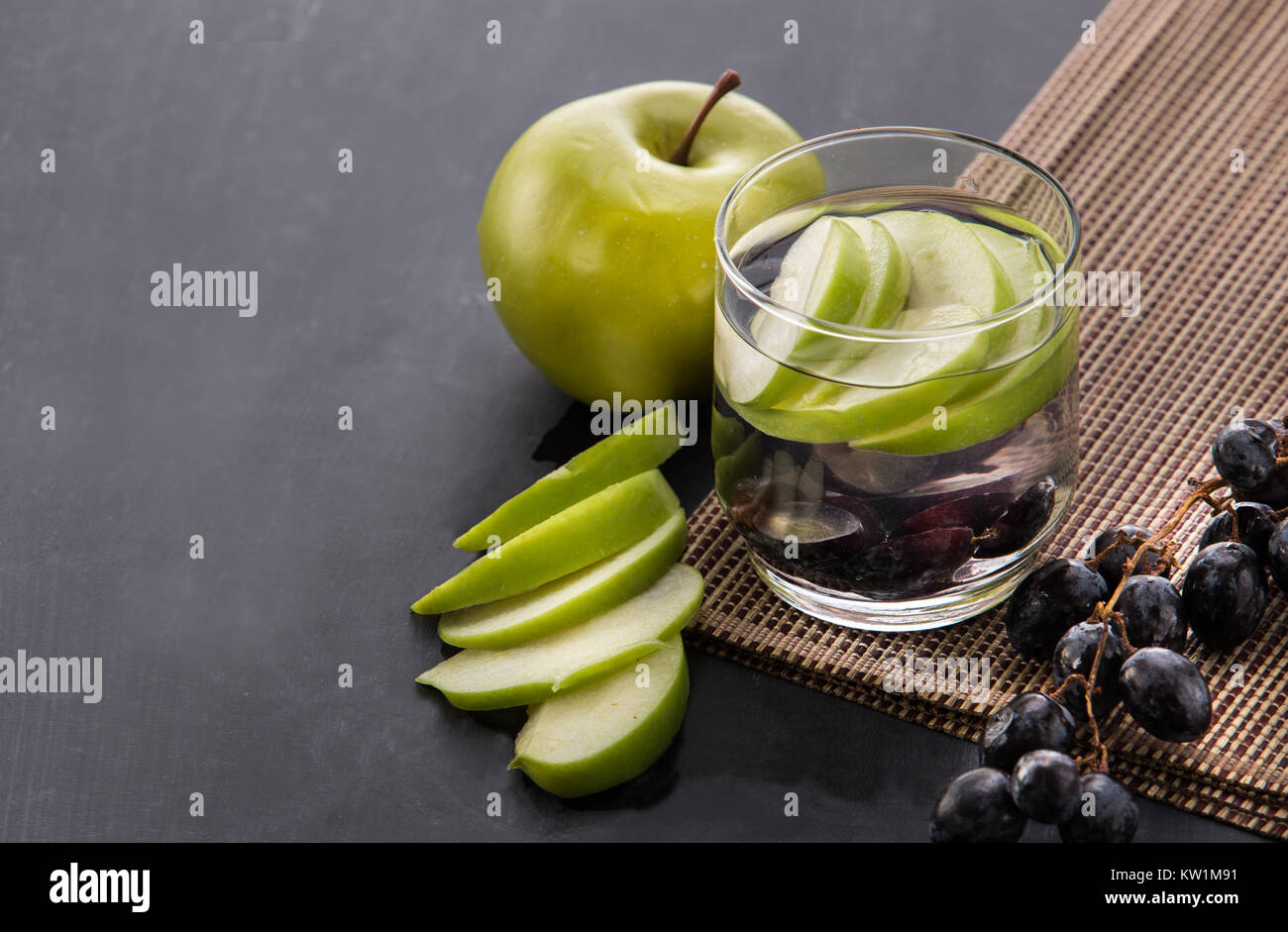 fresh fruit Flavored infused water mix of apple and grape Stock Photo ...