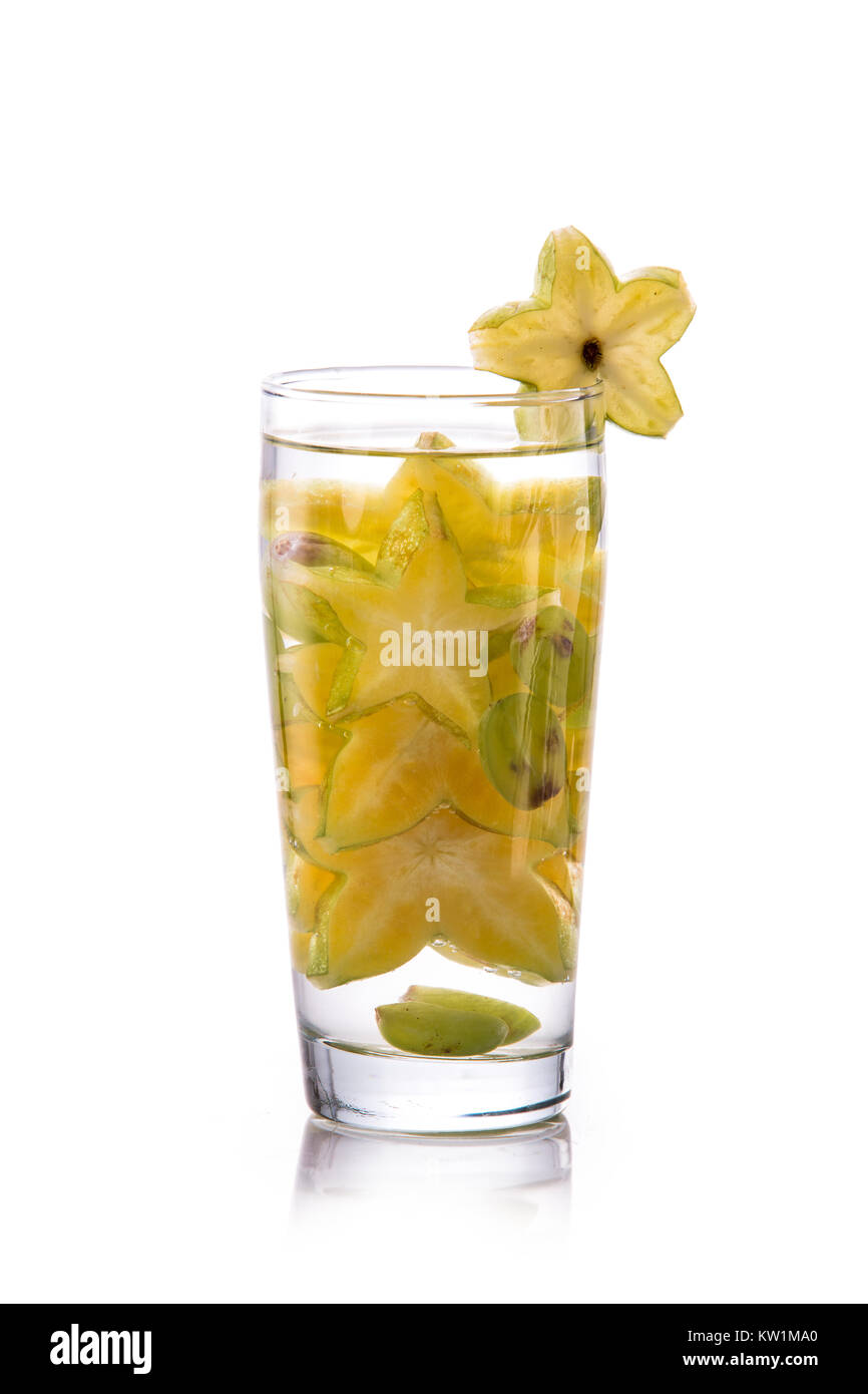 Infused fresh fruit water starfruit and grape. isolated over wh Stock ...