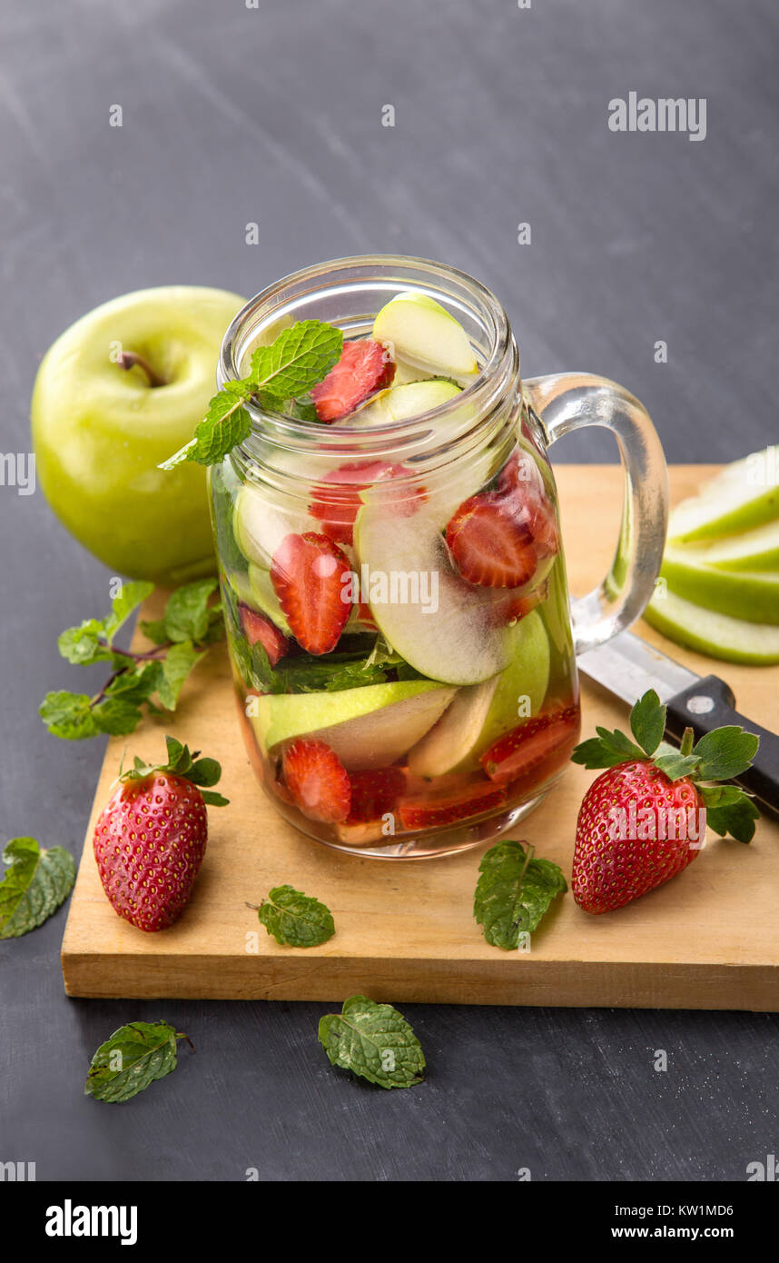 fresh fruit Flavored infused water mix of apple, strawberry and Stock ...