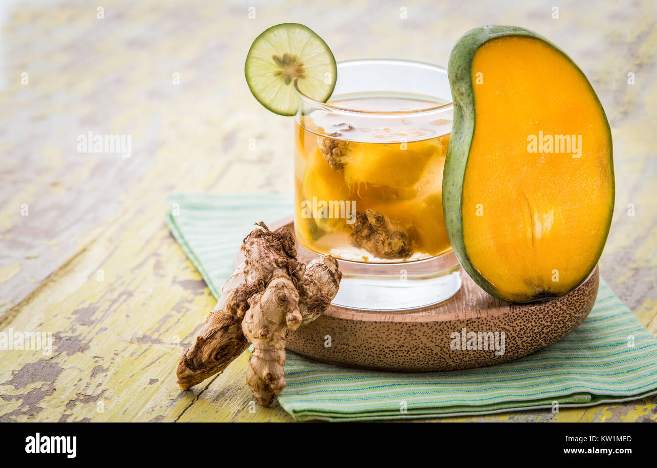 infused water mix of mango, and ginger Stock Photo - Alamy