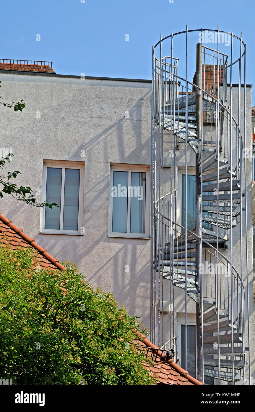 spiral stairs as fire escape Stock Photo - Alamy
