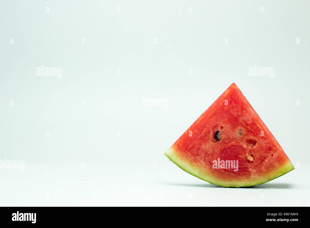 Cut and whole watermelon isolated on white background Stock Photo - Alamy