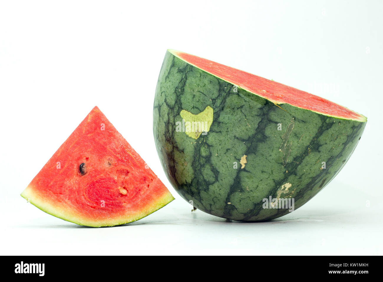 Cut and whole watermelon isolated on white background Stock Photo - Alamy