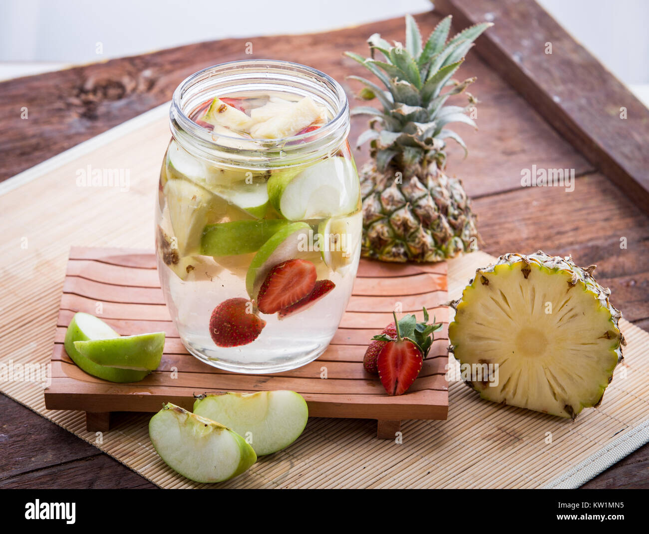 apple strawberry and pineapple infused water Stock Photo - Alamy